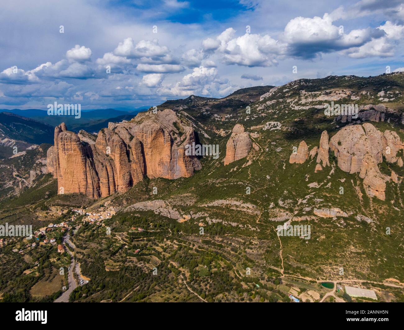 Aerial view of the Mallos de Riglos, a set of conglomerate rock ...