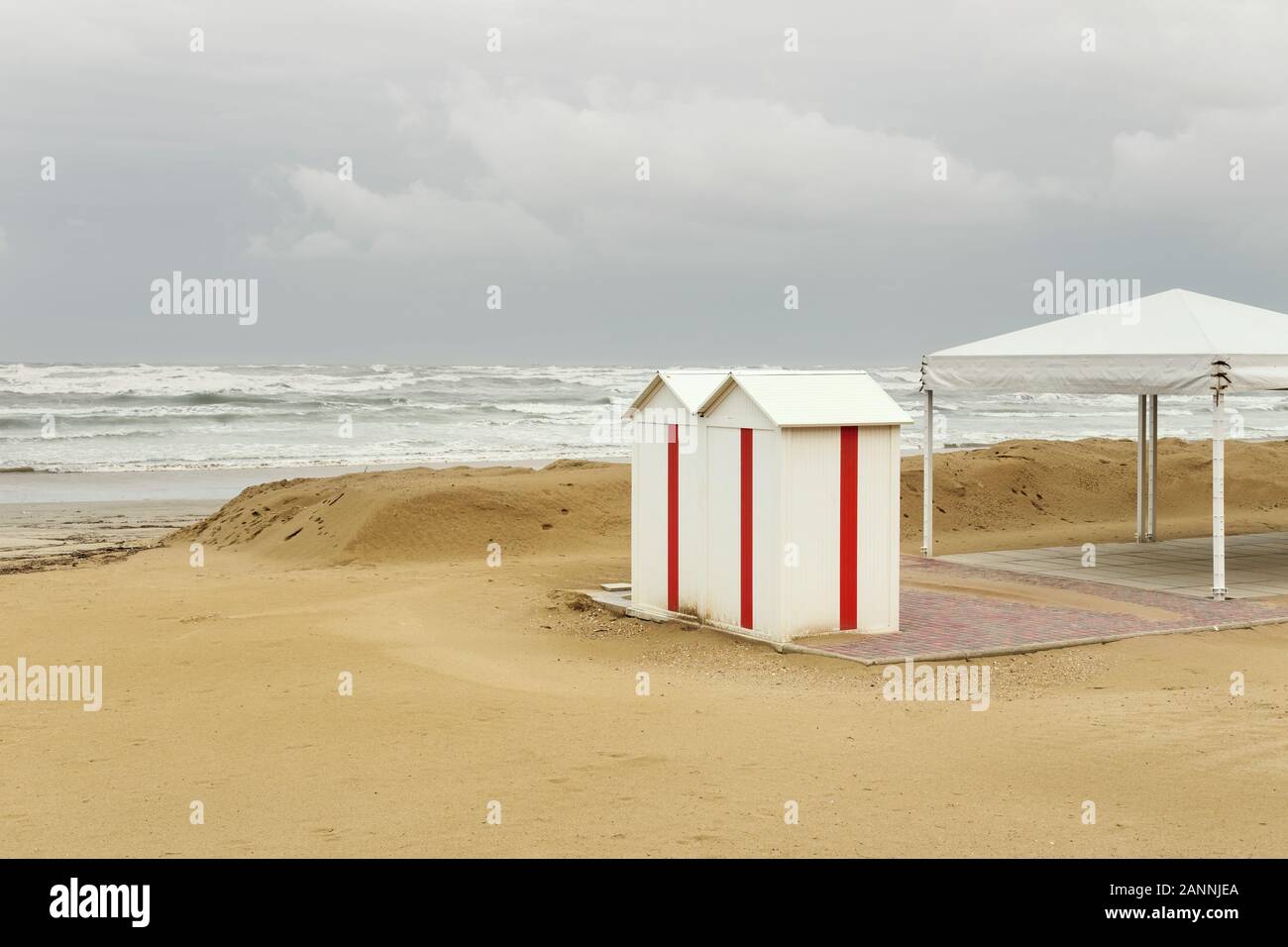 Winter day in the beach, bathing houses, bad weather Stock Photo - Alamy