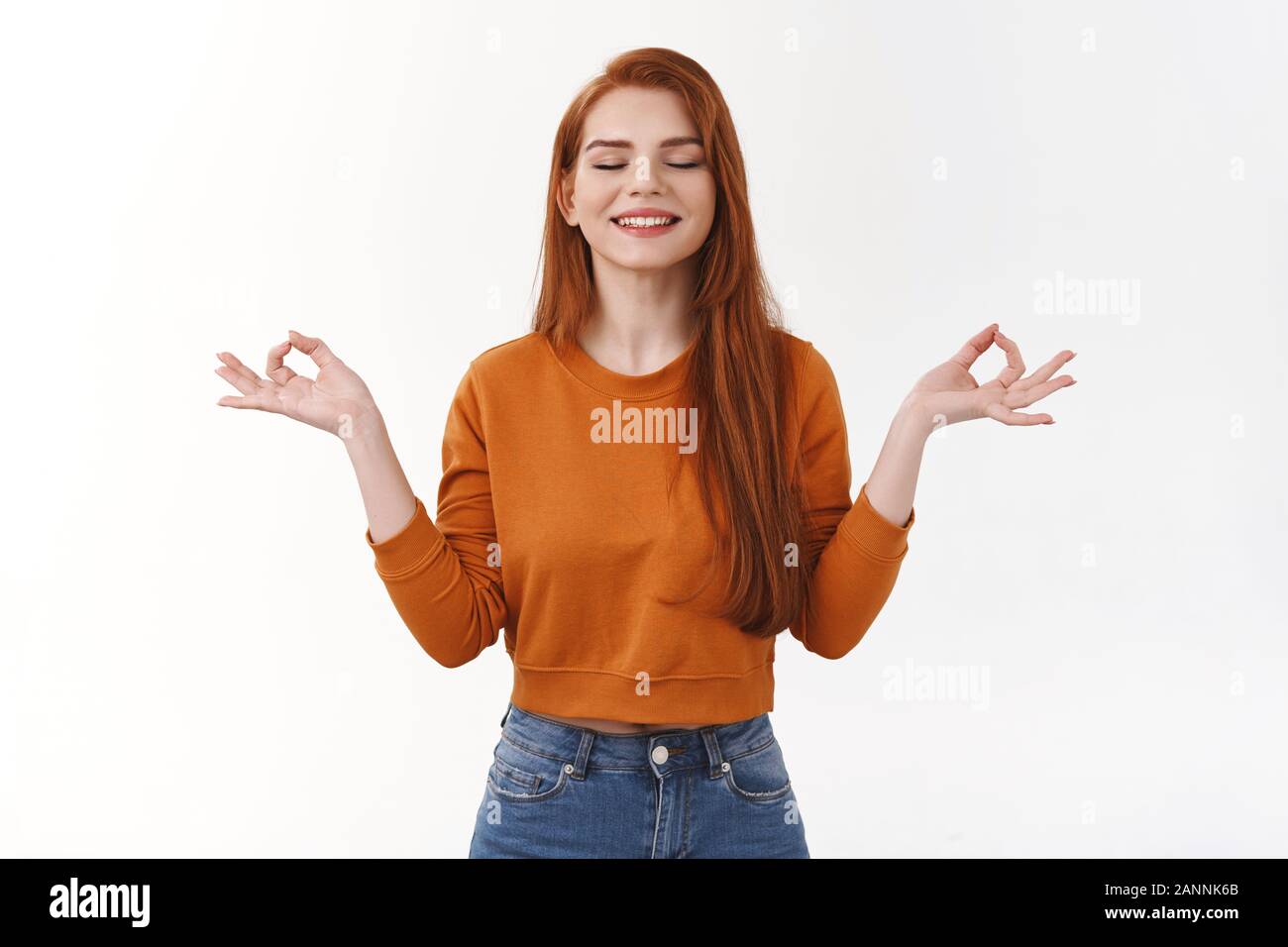 Happy relieved calm smiling redhead female close eyes feel relaxation ...