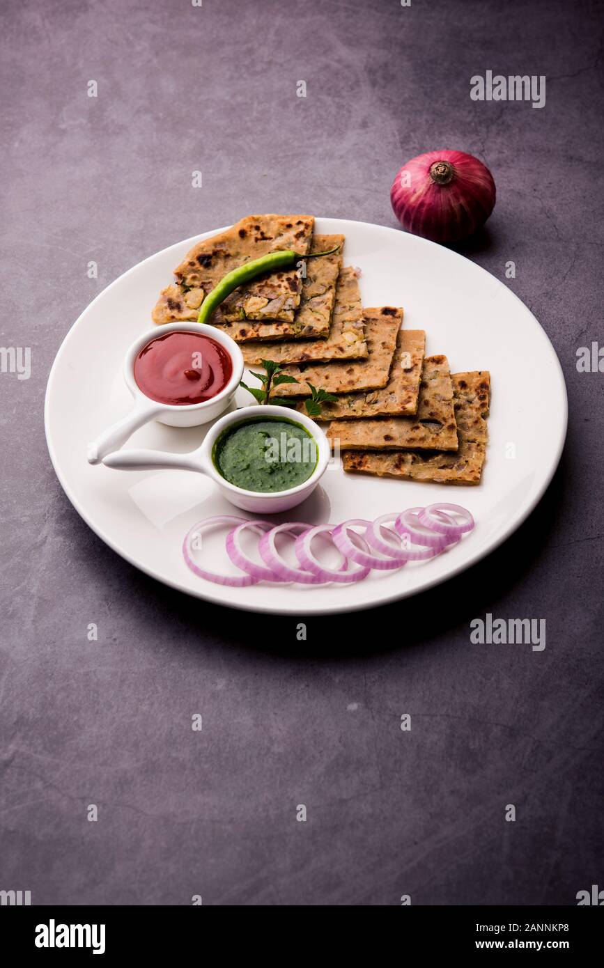 Onion Parotha / Pyaj parantha / kanda paratha served with tomato ...
