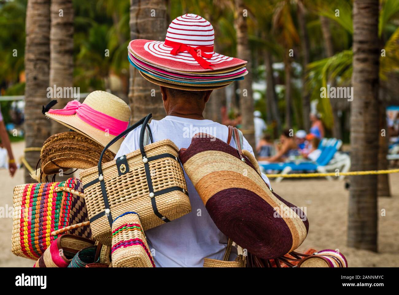 Street vendor selling straw hats hi-res stock photography and images ...