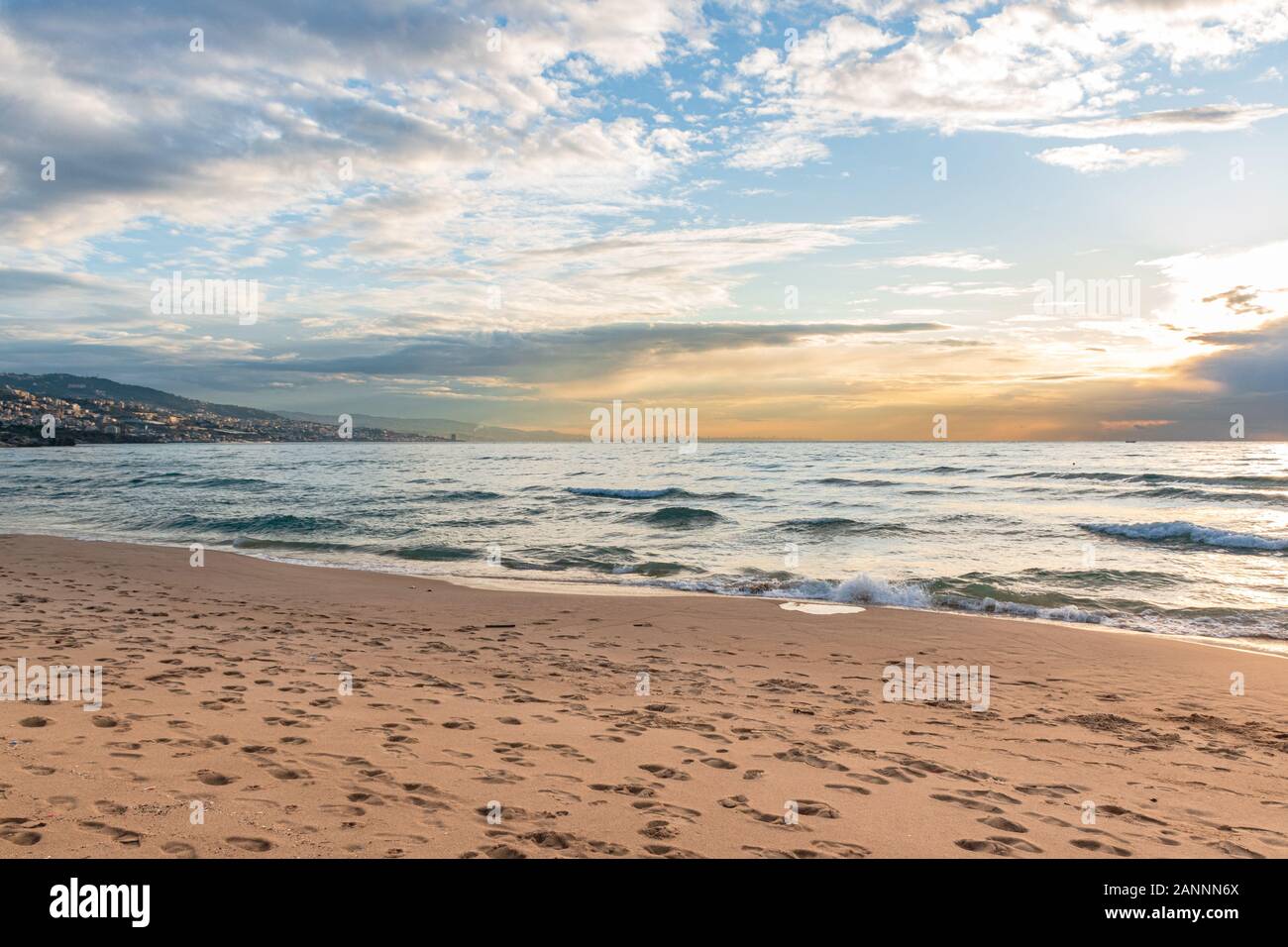 Coastline Byblos with clowdy sky and sunset Stock Photo - Alamy