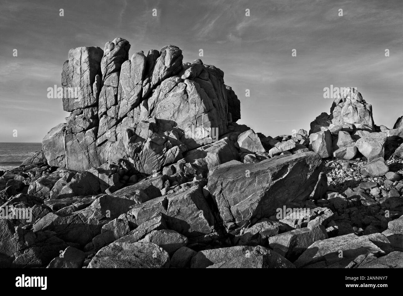 Coastal rock formation of exposed granite. B&W version Stock Photo - Alamy