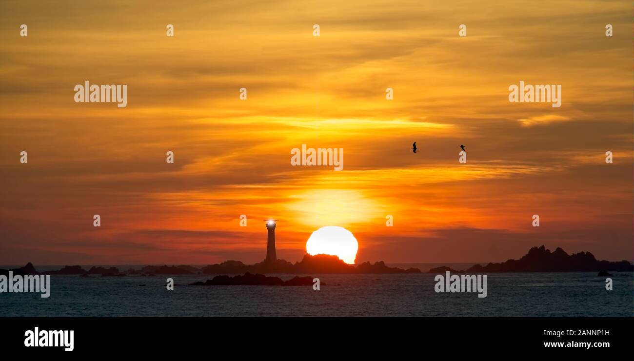 Serene sunset Les Hanois reef, southwest Guernsey Stock Photo - Alamy
