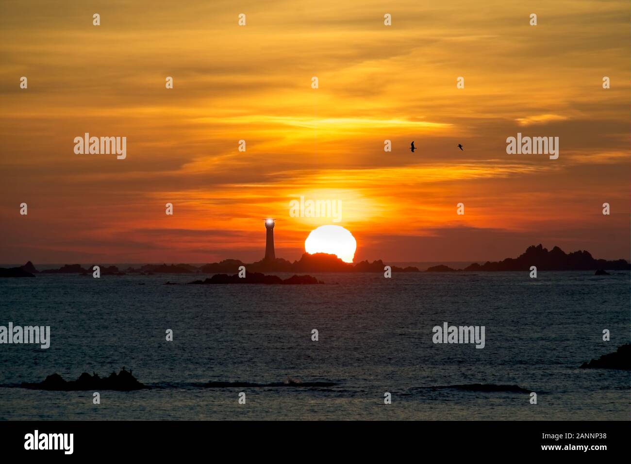 Serene sunset Les Hanois reef, southwest Guernsey Stock Photo - Alamy