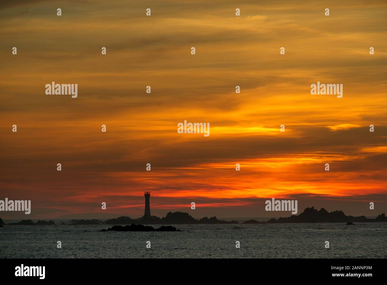 Serene sunset Les Hanois reef, southwest Guernsey Stock Photo - Alamy