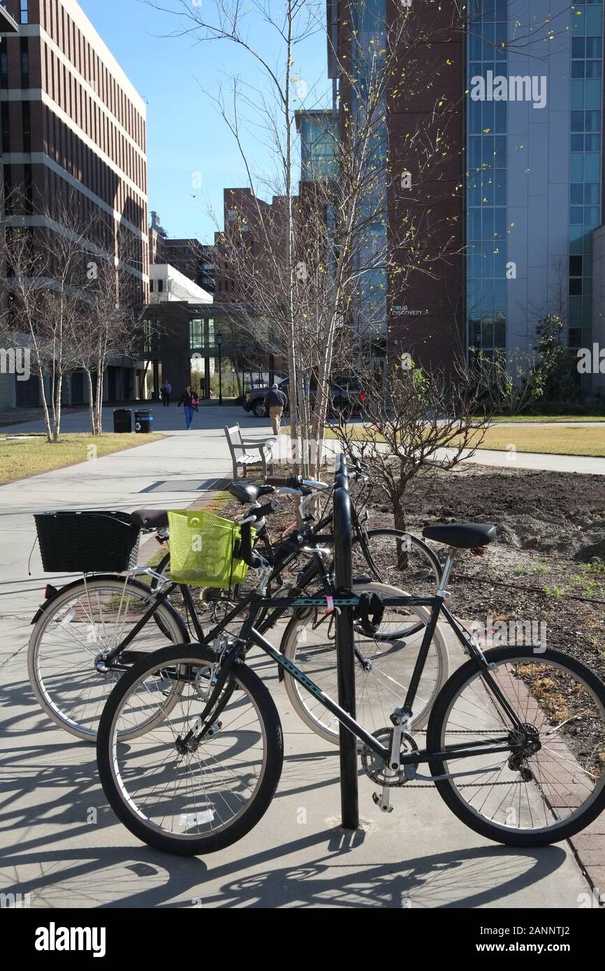 Bicycle Parked and Locked to Metal Post Embedded in Concrete Walkway ...