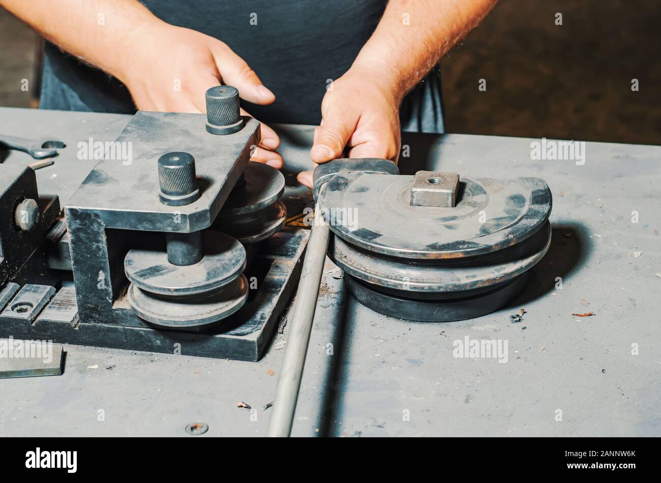 Pipe bending machine in the old workshop Stock Photo - Alamy