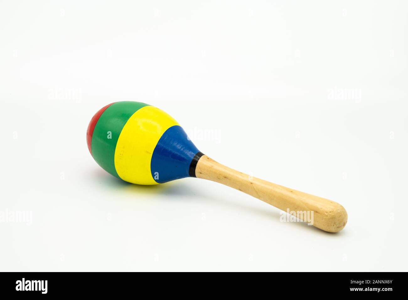 Closeup of a colorful maracas lying on a white underground Stock Photo ...