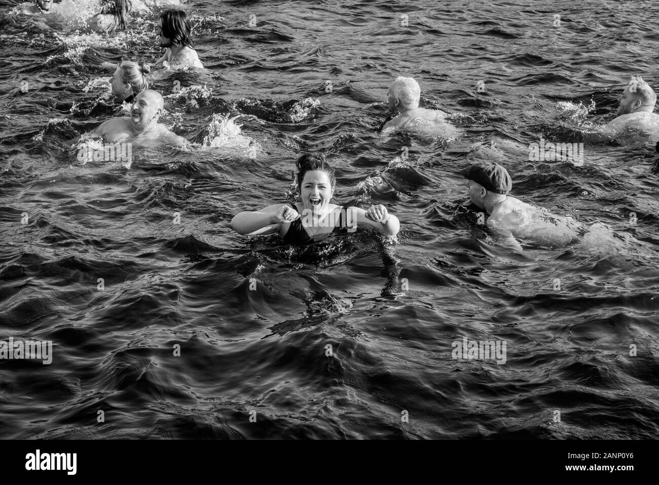 Group people swim in Black and White Stock Photos & Images - Alamy