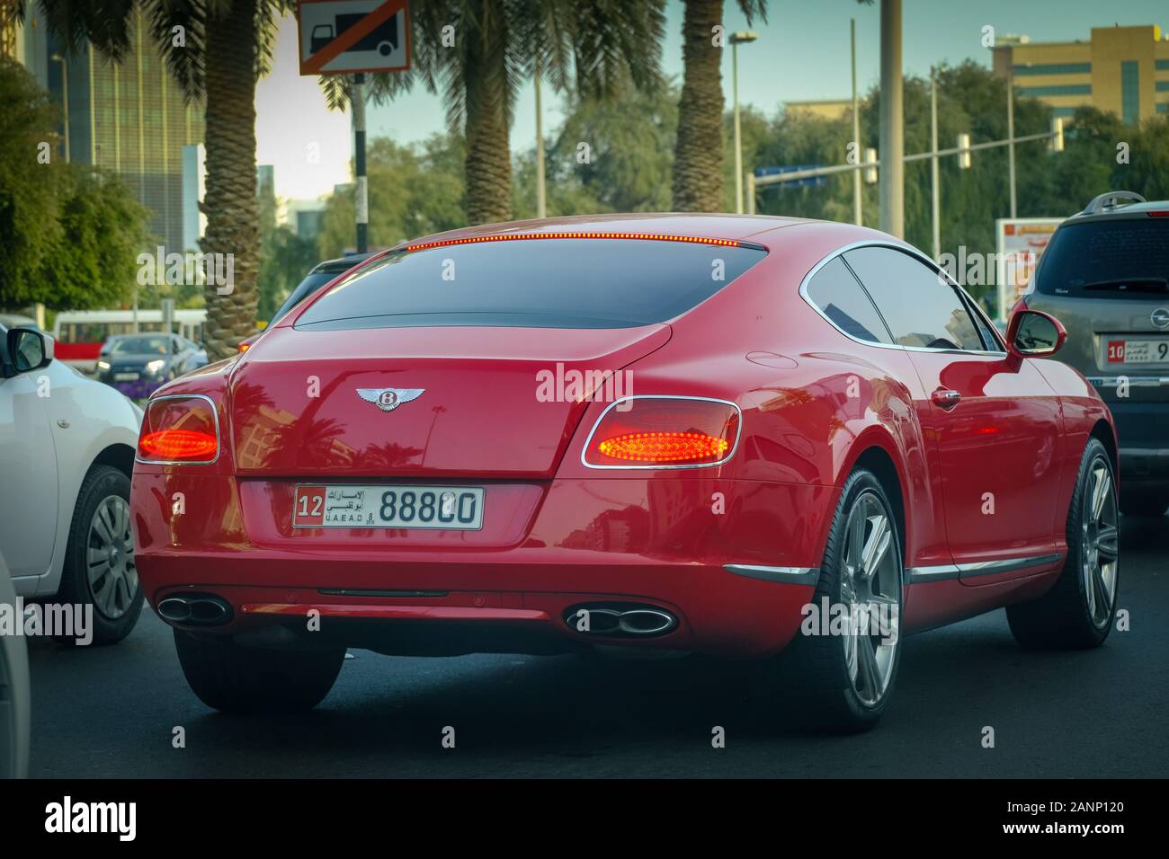 Red Bentley on Abu Dhabi’s road Stock Photo - Alamy