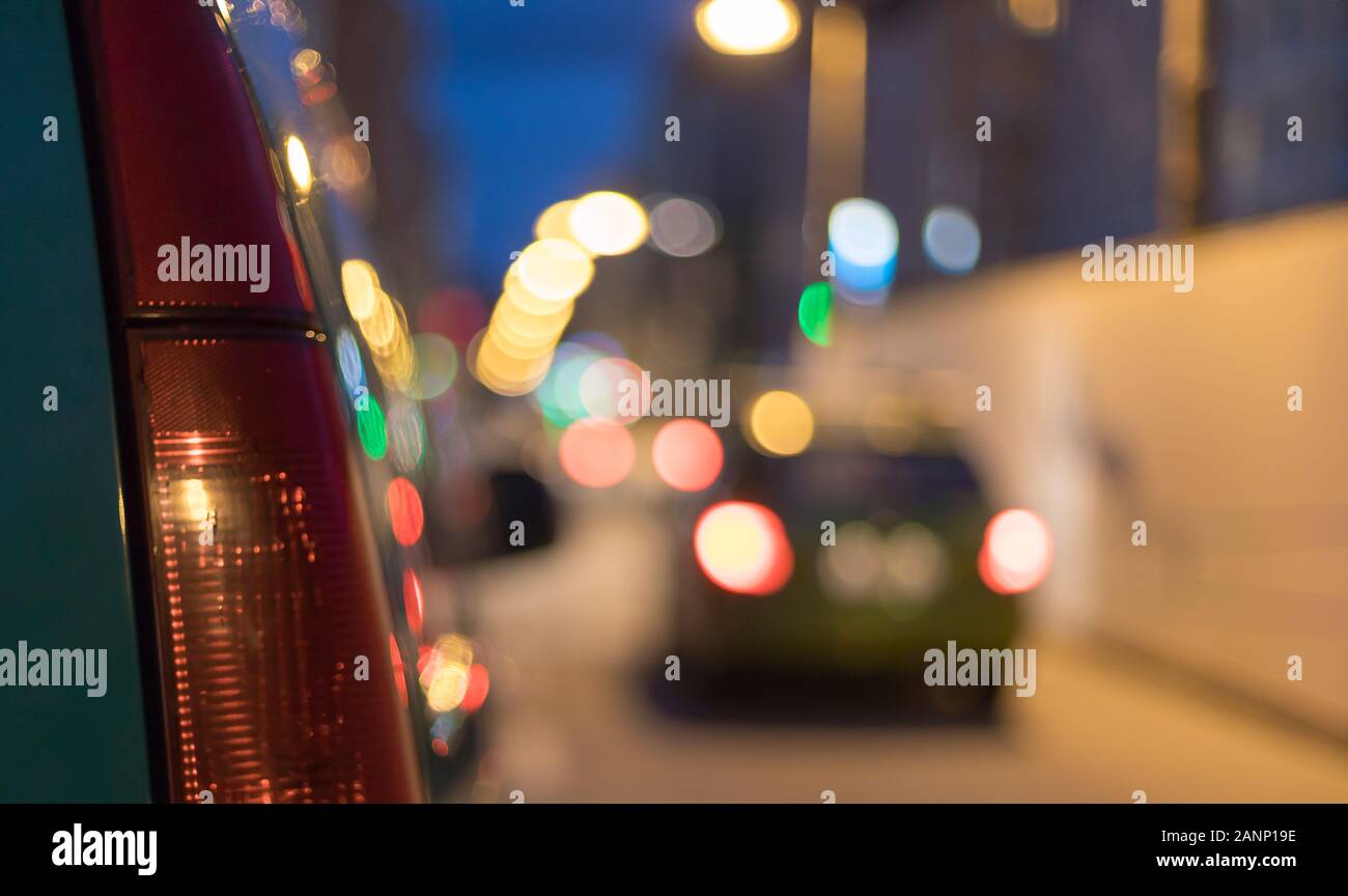 Closeup of car backlight in the night, urban city Stock Photo - Alamy