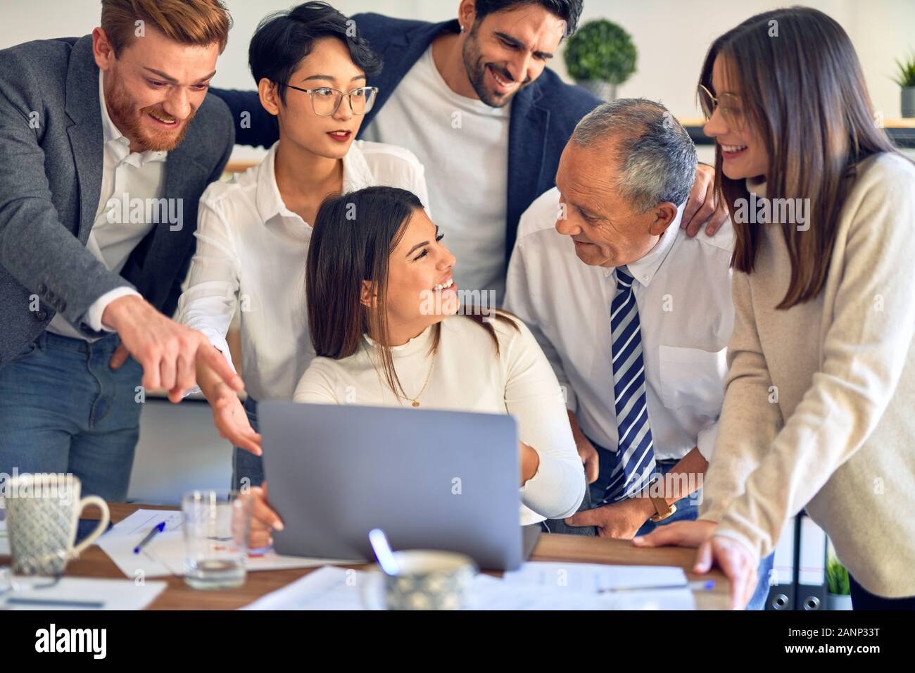 Group of business workers smiling happy and confident. One of them ...