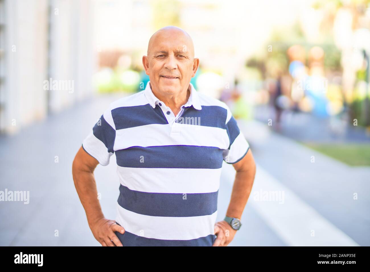 Senior handsome man smiling happy and confident. Standing with smile on ...