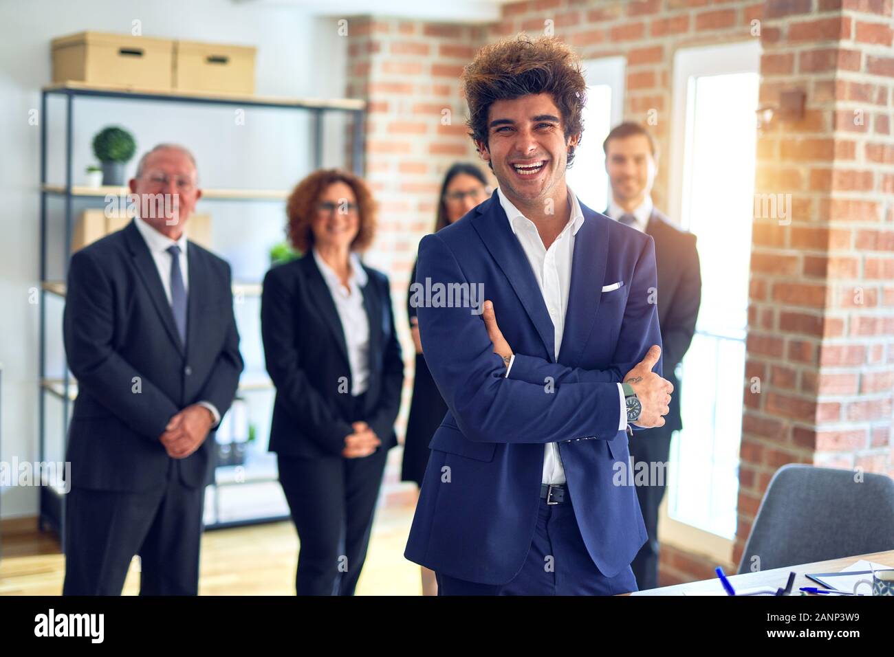 Group of business workers smiling happy and confident in a meeting ...