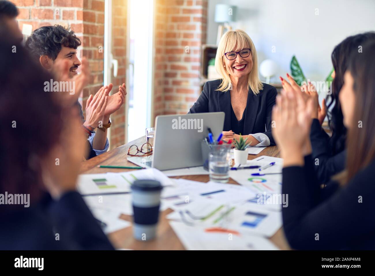 Group of business workers smiling happy and confident. Working together ...