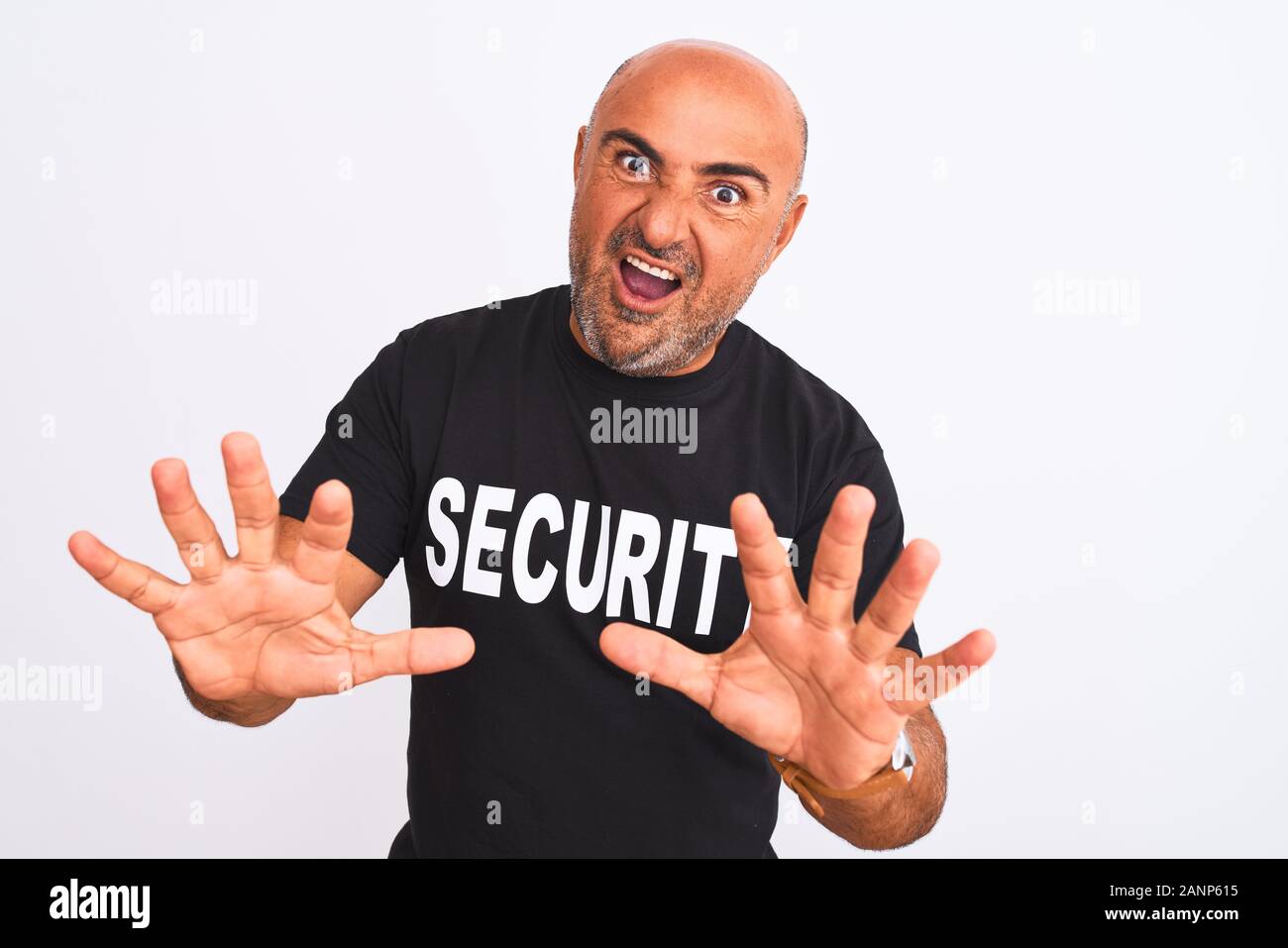 Middle age safeguard man wearing security uniform standing over ...