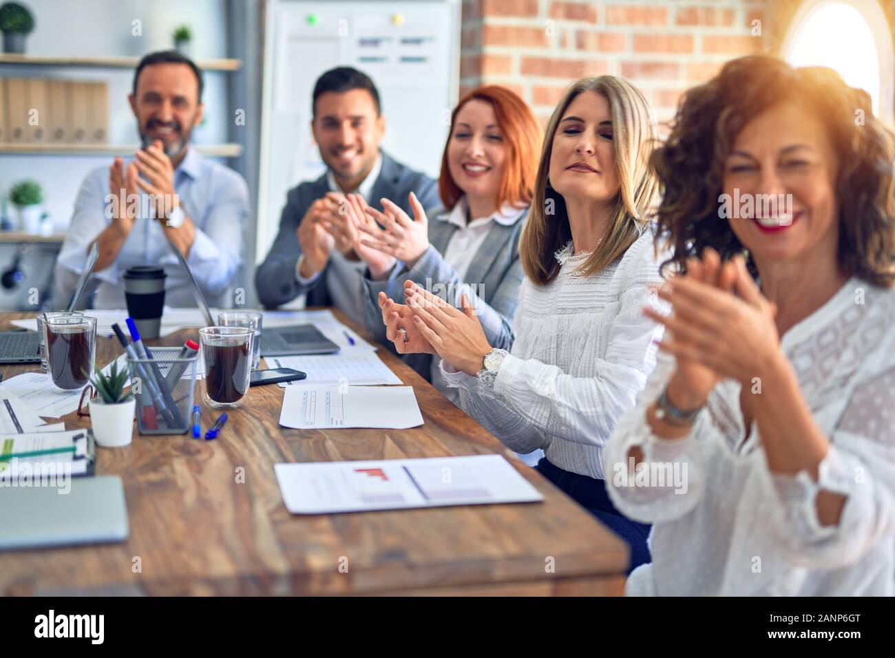 Group of business workers smiling happy and confident. Working together ...