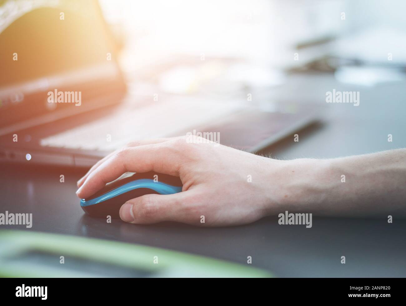 Close up of computer mouse used by a male hand Stock Photo - Alamy