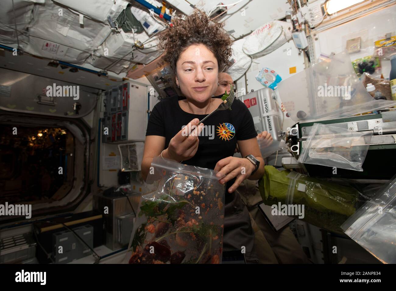 Astronaut eating in space hi-res stock photography and images - Alamy