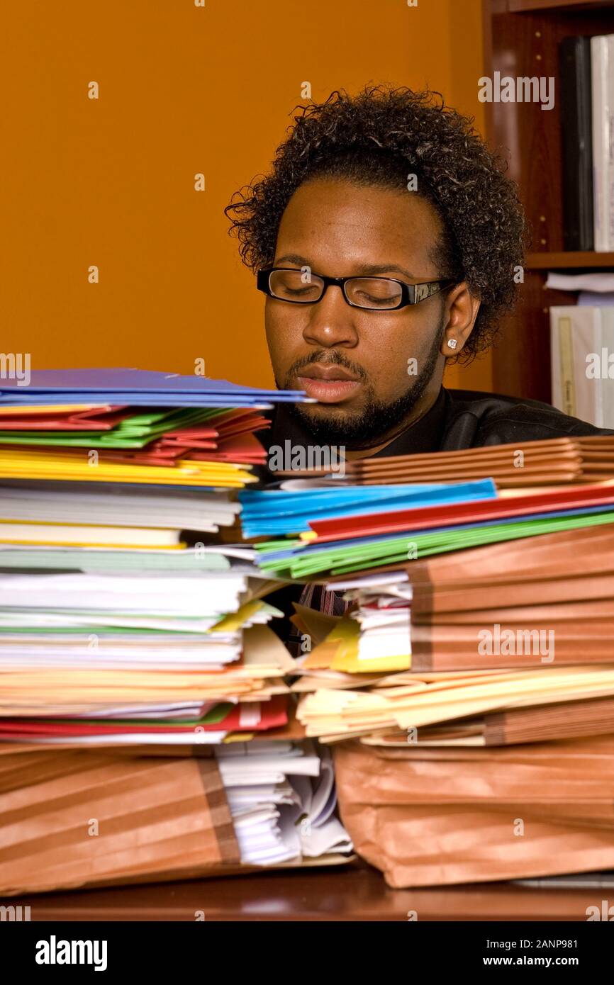 Buried in paperwork hi-res stock photography and images - Alamy