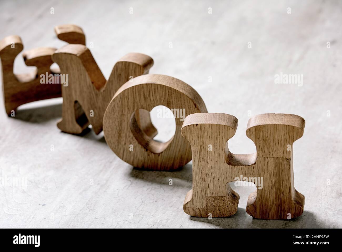 Wooden letters HOME Stock Photo - Alamy