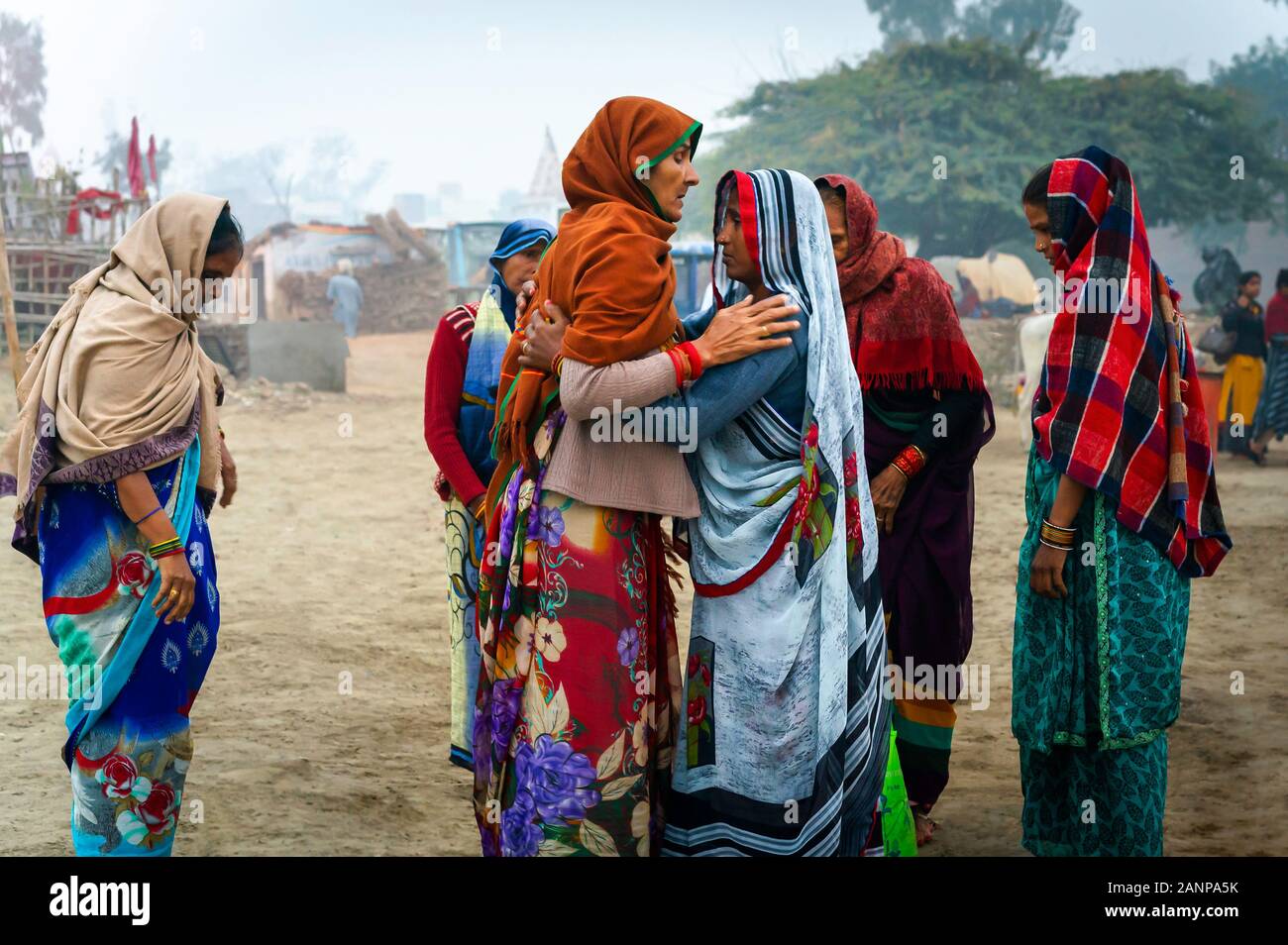Hindu women embrace each other in ritual of forgiveness witness by ...