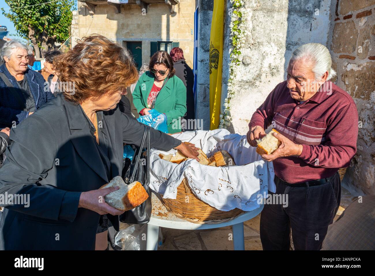 Distributing the traditional 'Artos bread', cinnamon flavoured ...