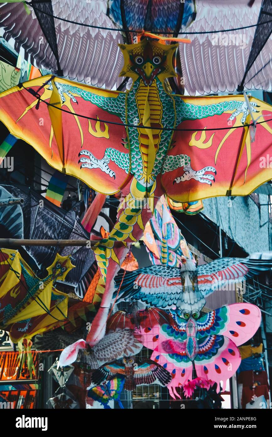 Chinese kite with a dragon drawing Stock Photo - Alamy