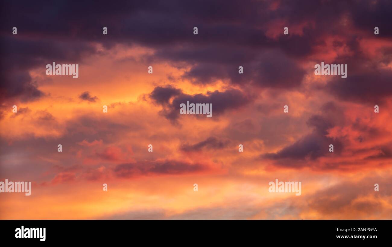 Colorful sunset sky background with reddish colors Stock Photo - Alamy