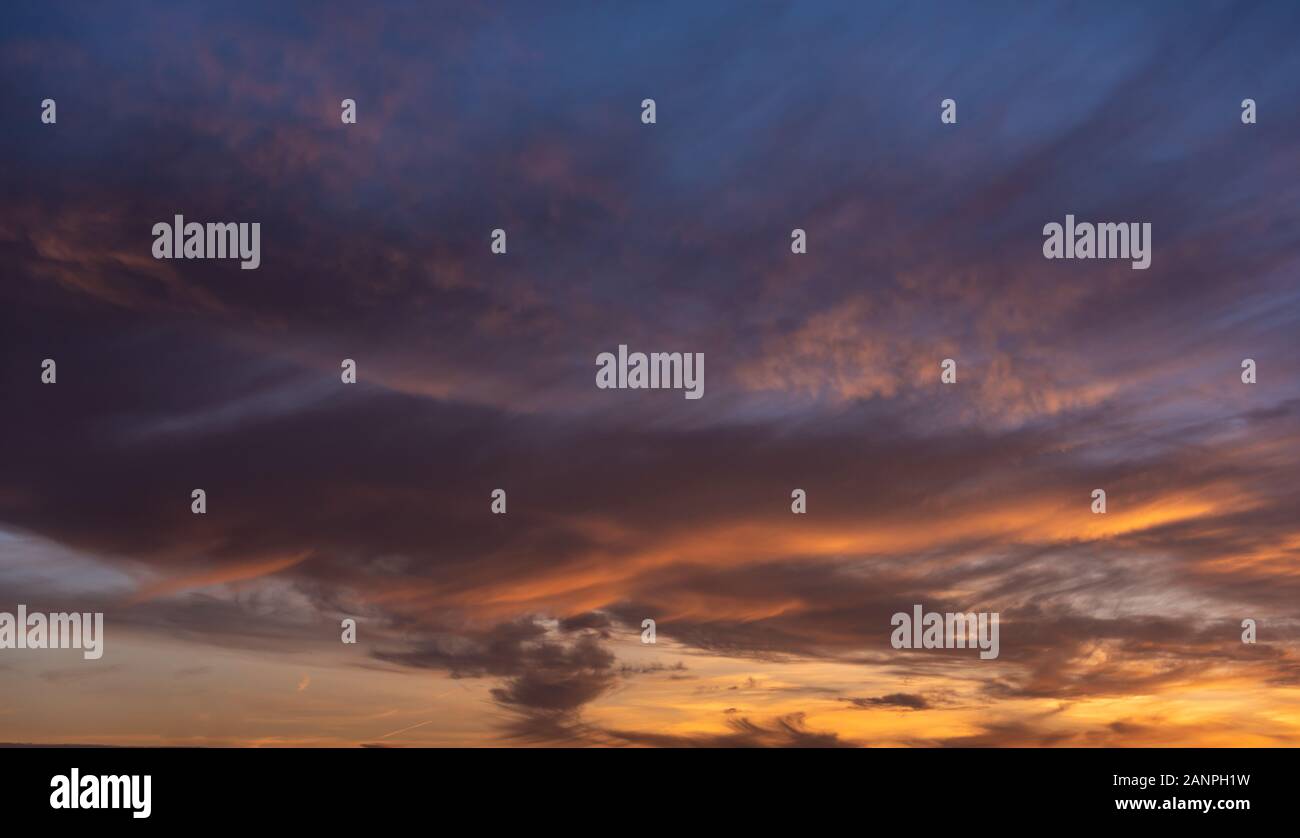 Colorful sunset sky background with reddish colors Stock Photo - Alamy