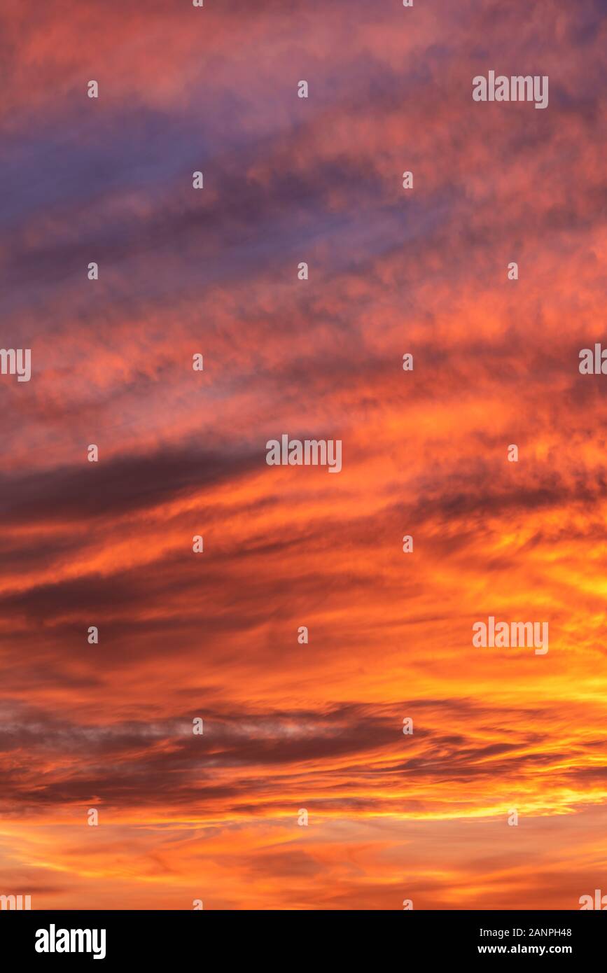 Colorful sunset sky background with reddish colors Stock Photo - Alamy