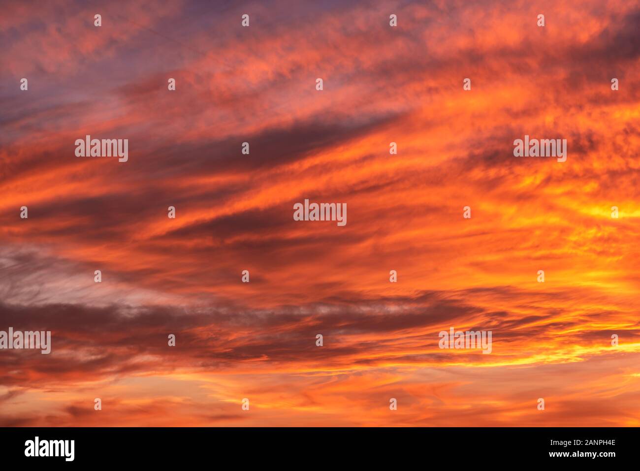 Colorful sunset sky background with reddish colors Stock Photo - Alamy