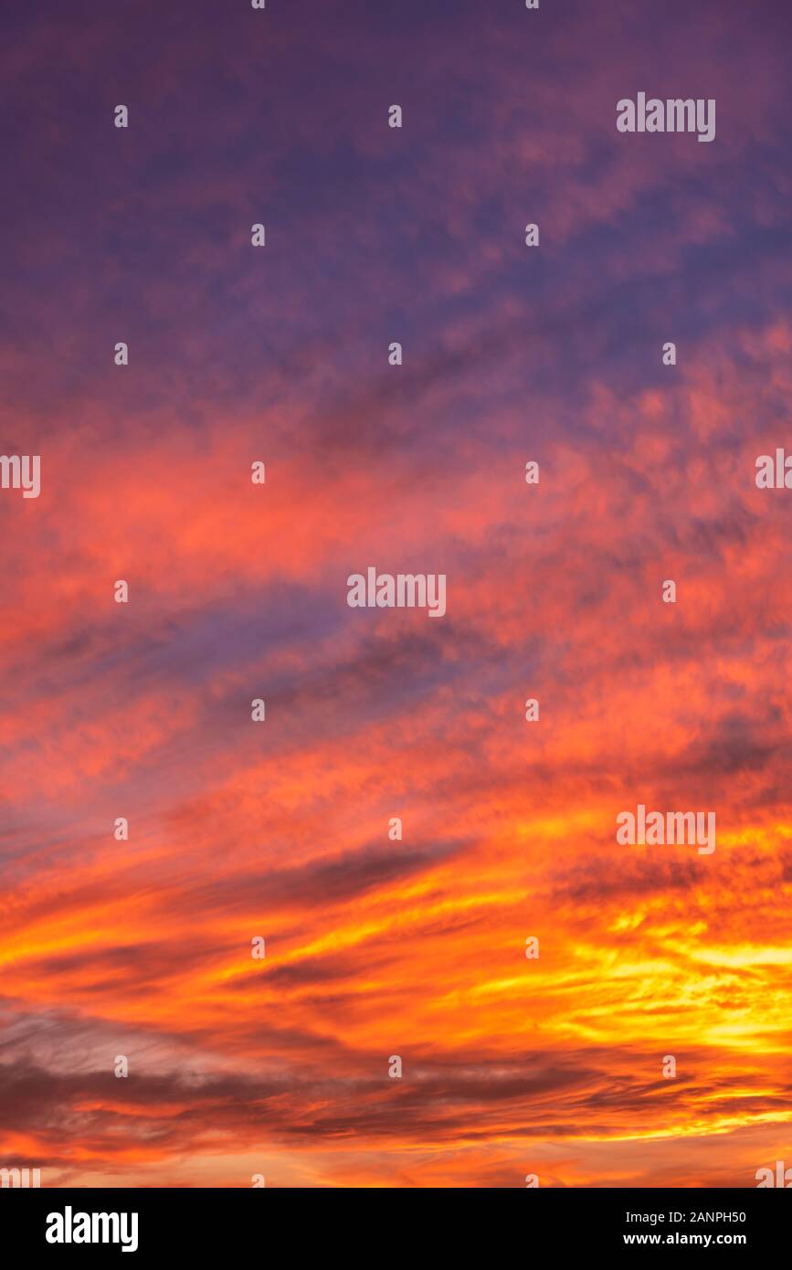 Colorful sunset sky background with reddish colors Stock Photo - Alamy