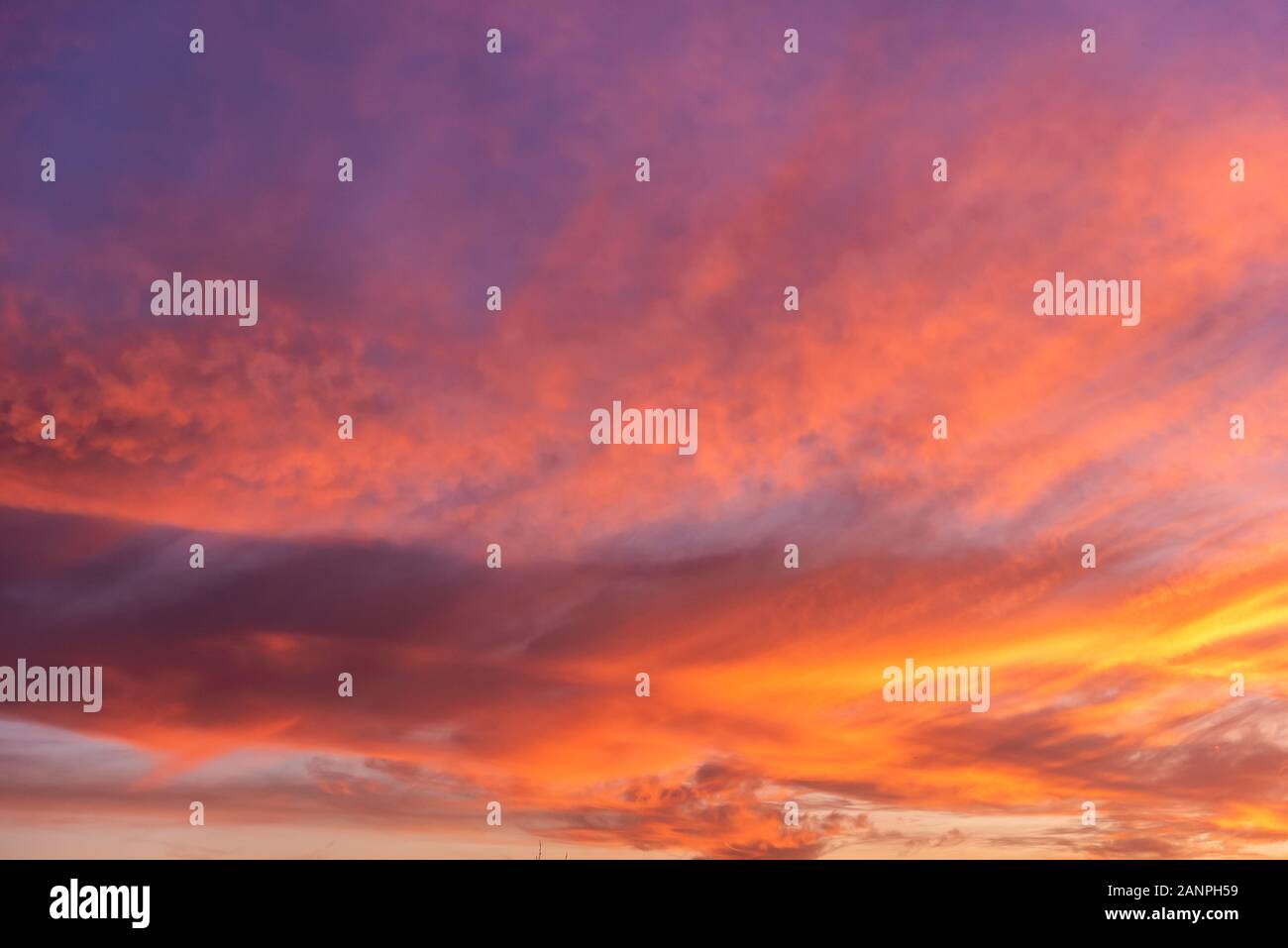 Colorful sunset sky background with reddish colors Stock Photo - Alamy