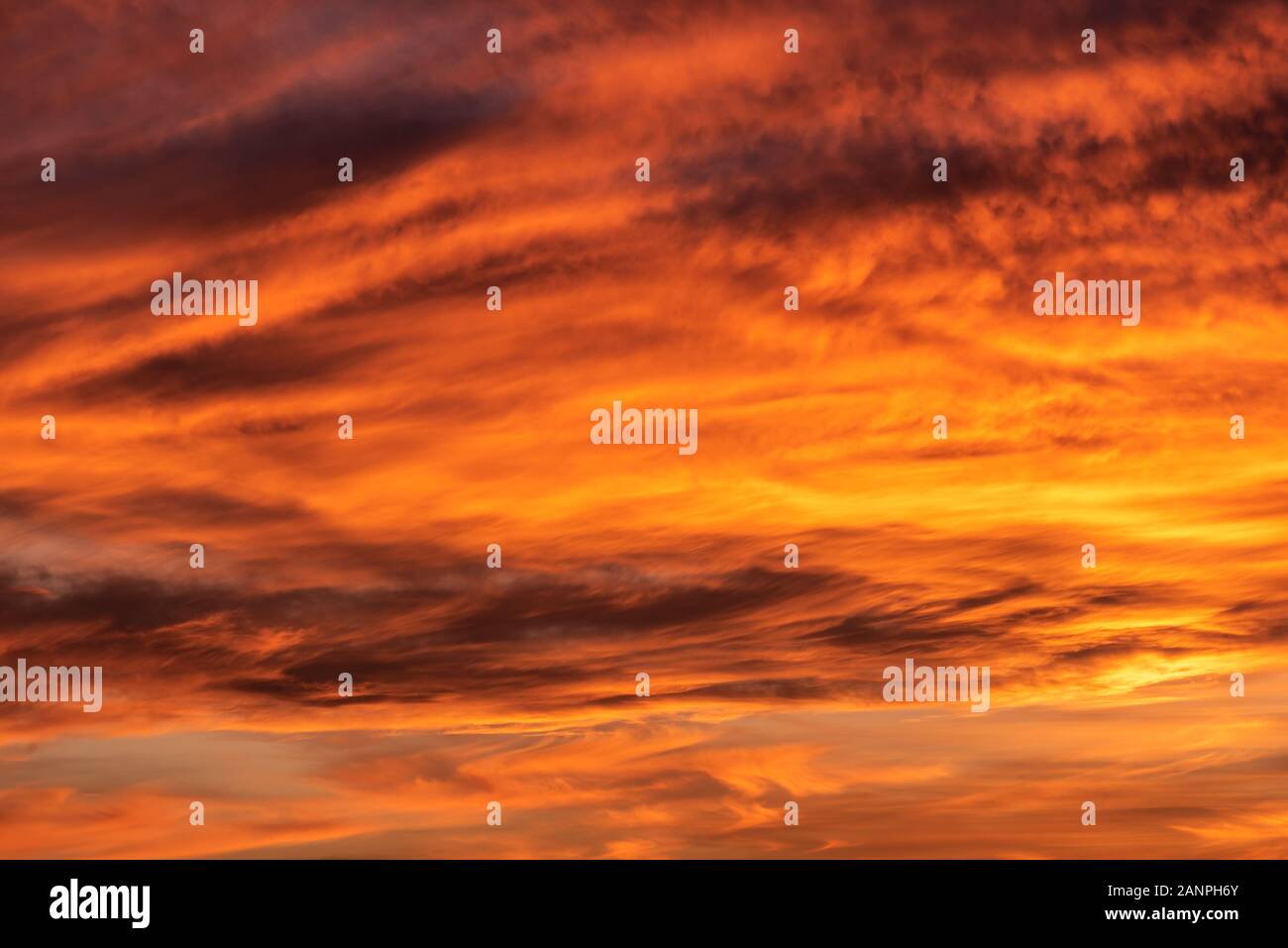 Colorful sunset sky background with reddish colors Stock Photo - Alamy