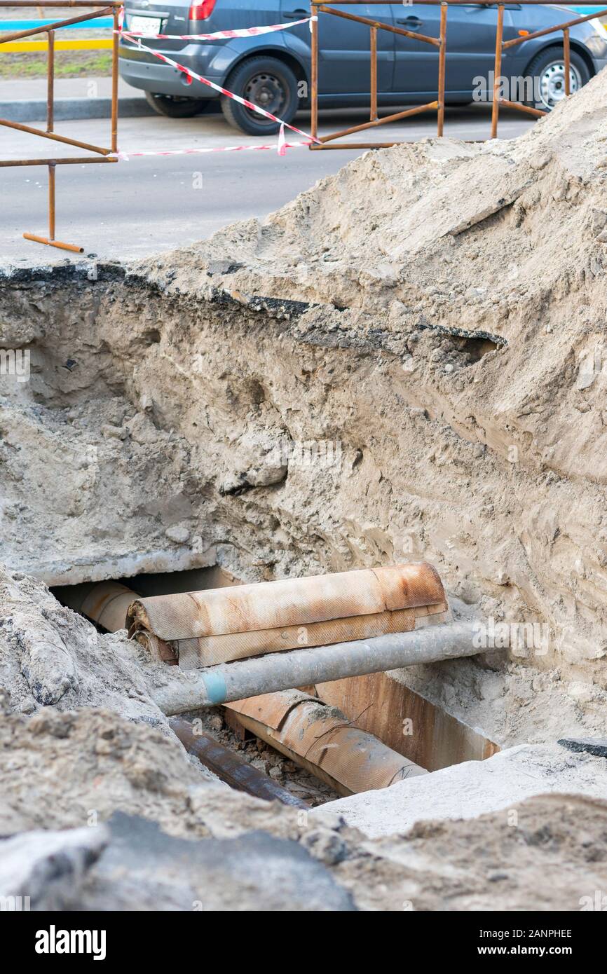 Rusty Sewer Pipes Underground. Repair of underground water supply ...