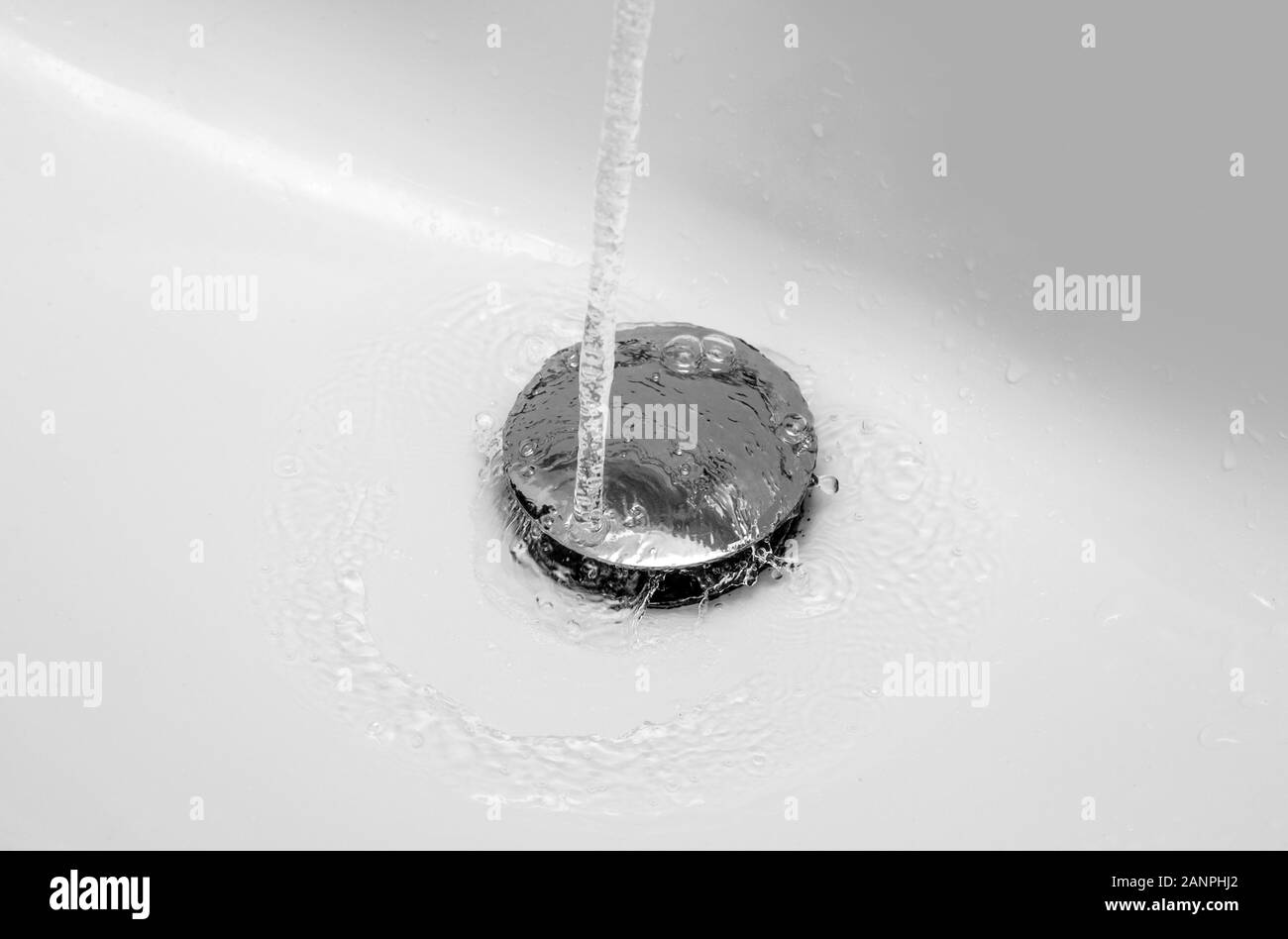 Chrome sink drain Black and White Stock Photos & Images - Alamy