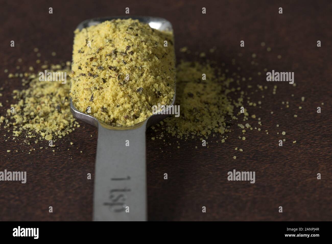 Lemon Pepper Spilled from a Teaspoon Stock Photo - Alamy