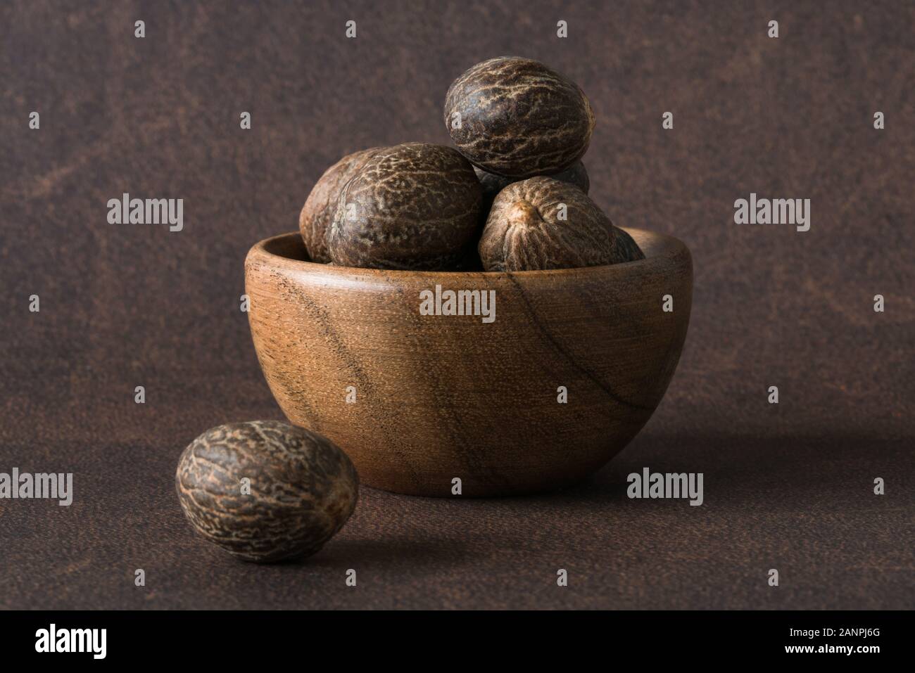 Whole Nutmeg on a Bowl Stock Photo - Alamy