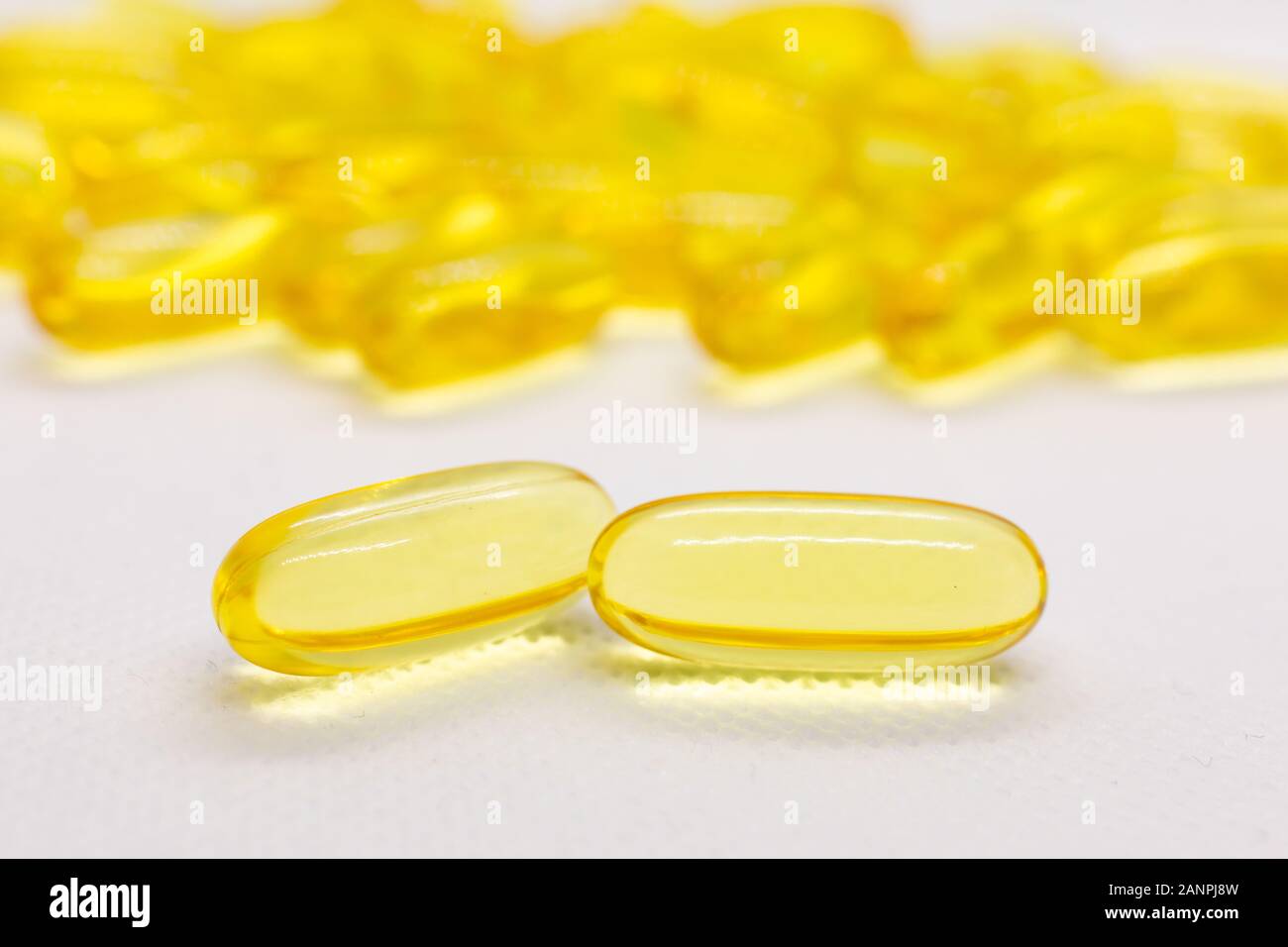 Fish oil capsules, Omega-3 vitamin tablets Stock Photo - Alamy