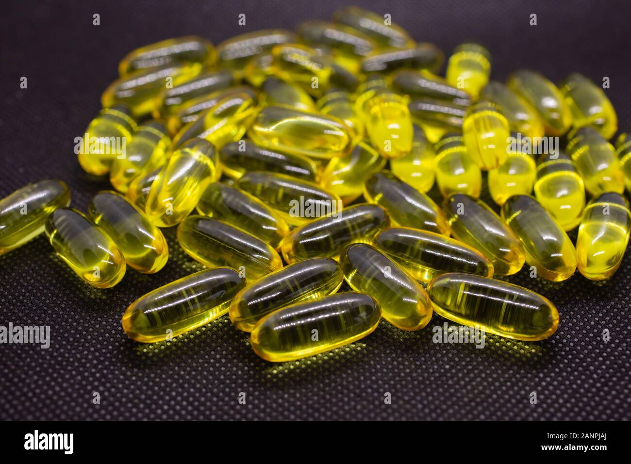 Fish oil capsules, Omega-3 vitamin tablets Stock Photo - Alamy