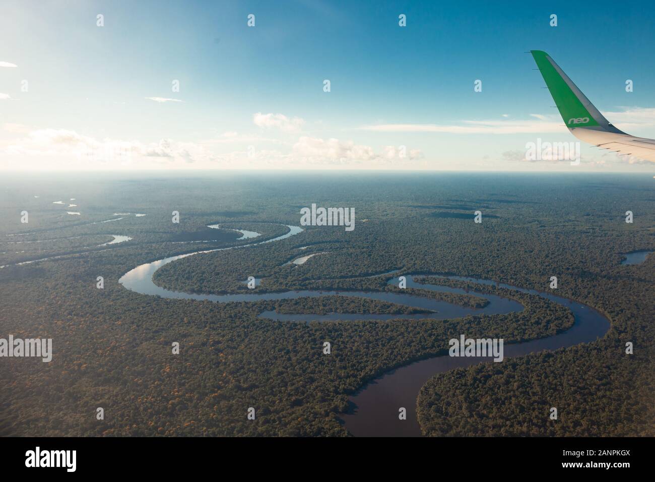 Airplane flying above forest hi-res stock photography and images - Alamy