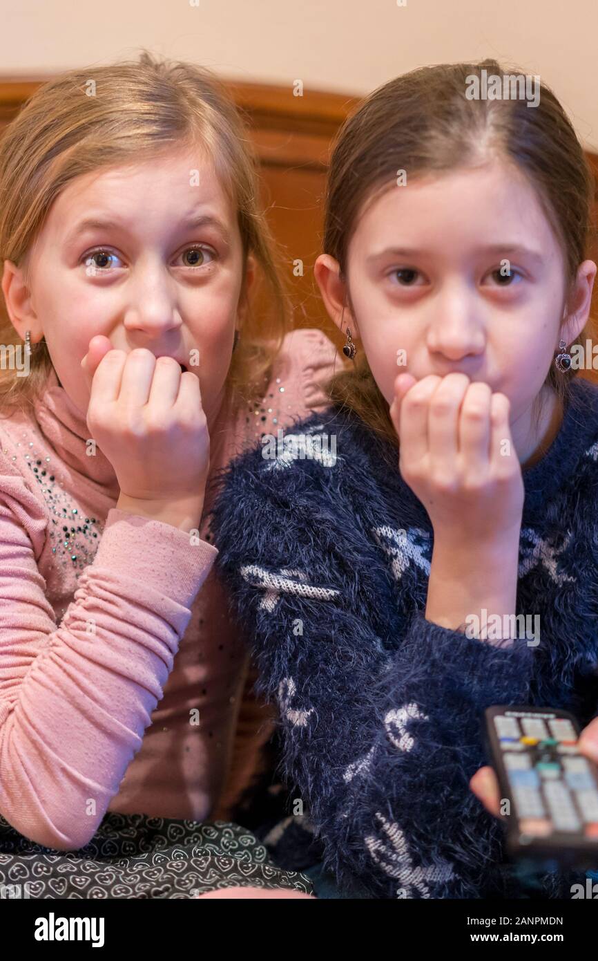 people, children, television, friends and friendship concept - two ...