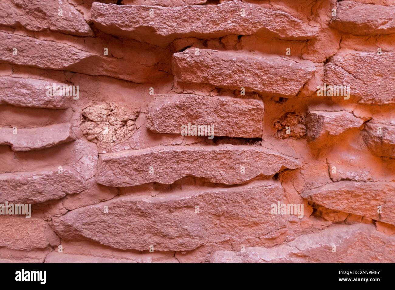 Ancient red stone wall in the Wukoki Pueblo Stock Photo - Alamy