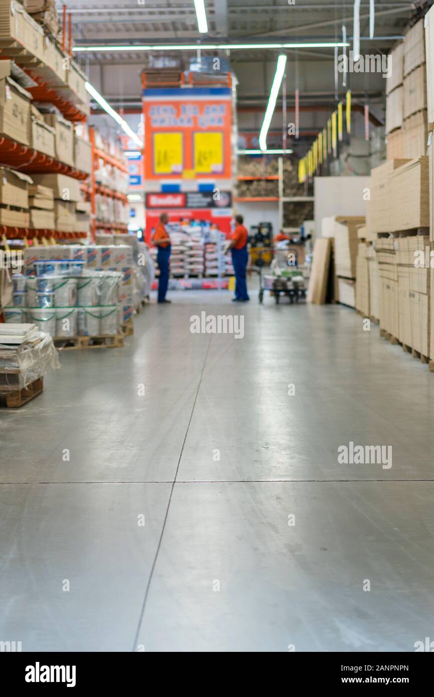 Warehouse tree. Pallets with wooden plates in a warehouse or in a ...