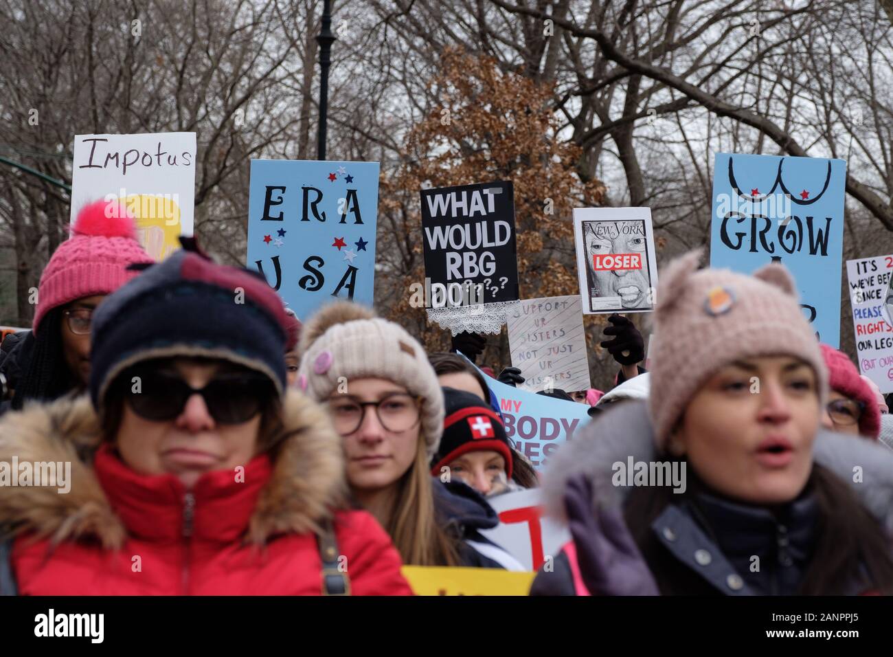 New York, New York, USA. 18th Jan, 2020. People hold signs and ...