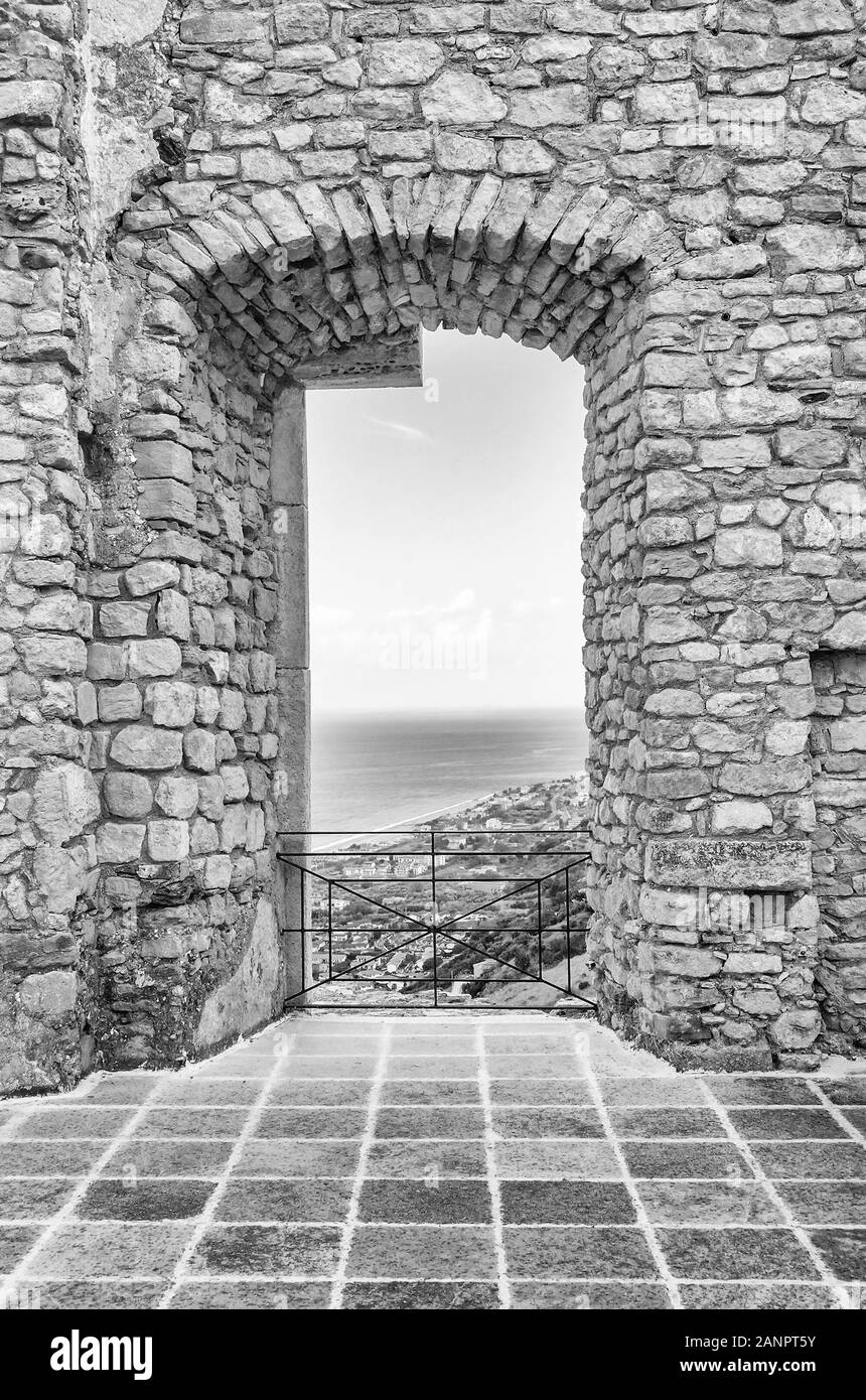 Ancient window from the ruins of an old castle with beautiful view over ...