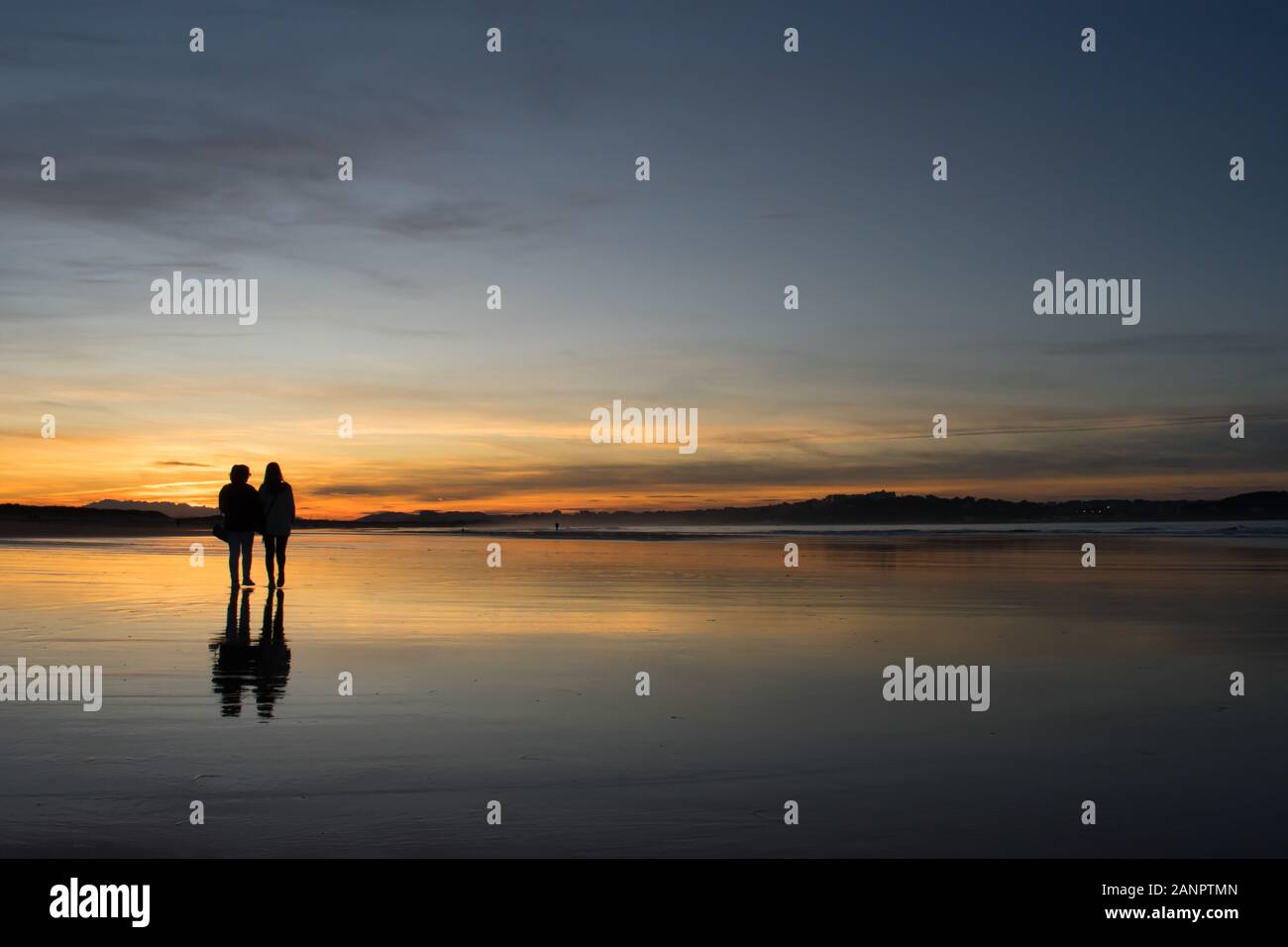Sunset in Somo beach Stock Photo - Alamy