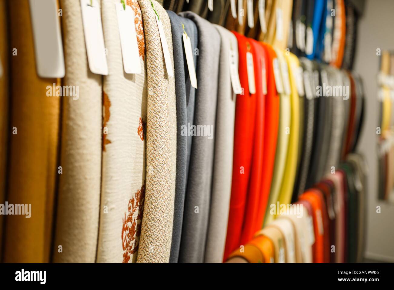 Colorful fabric textile on showcase in store Stock Photo - Alamy